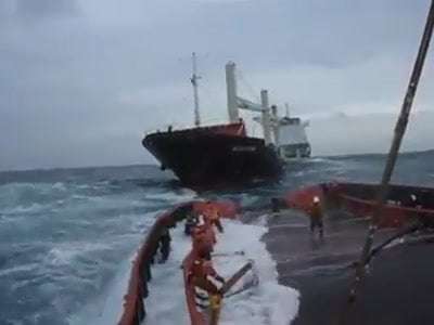 POPA.COM.BR Tug Boat Crew Working In Rough Sea